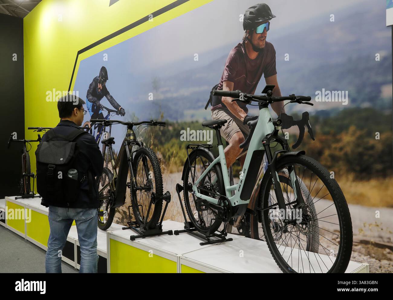 Visitors look at bicycles during the Taipei Cycle Exhibition at the ...