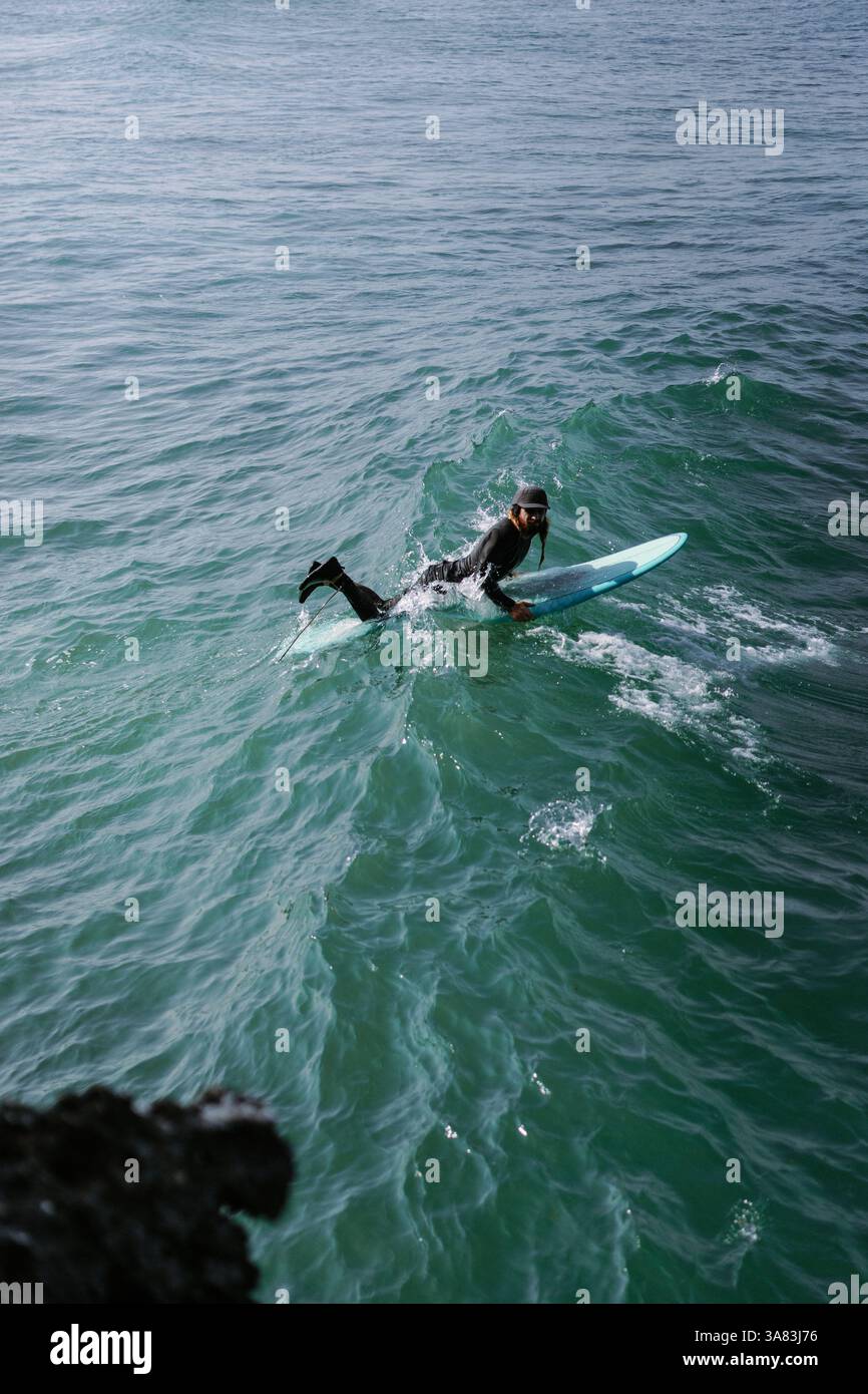 Male surfing in ocean hi-res stock photography and images - Alamy