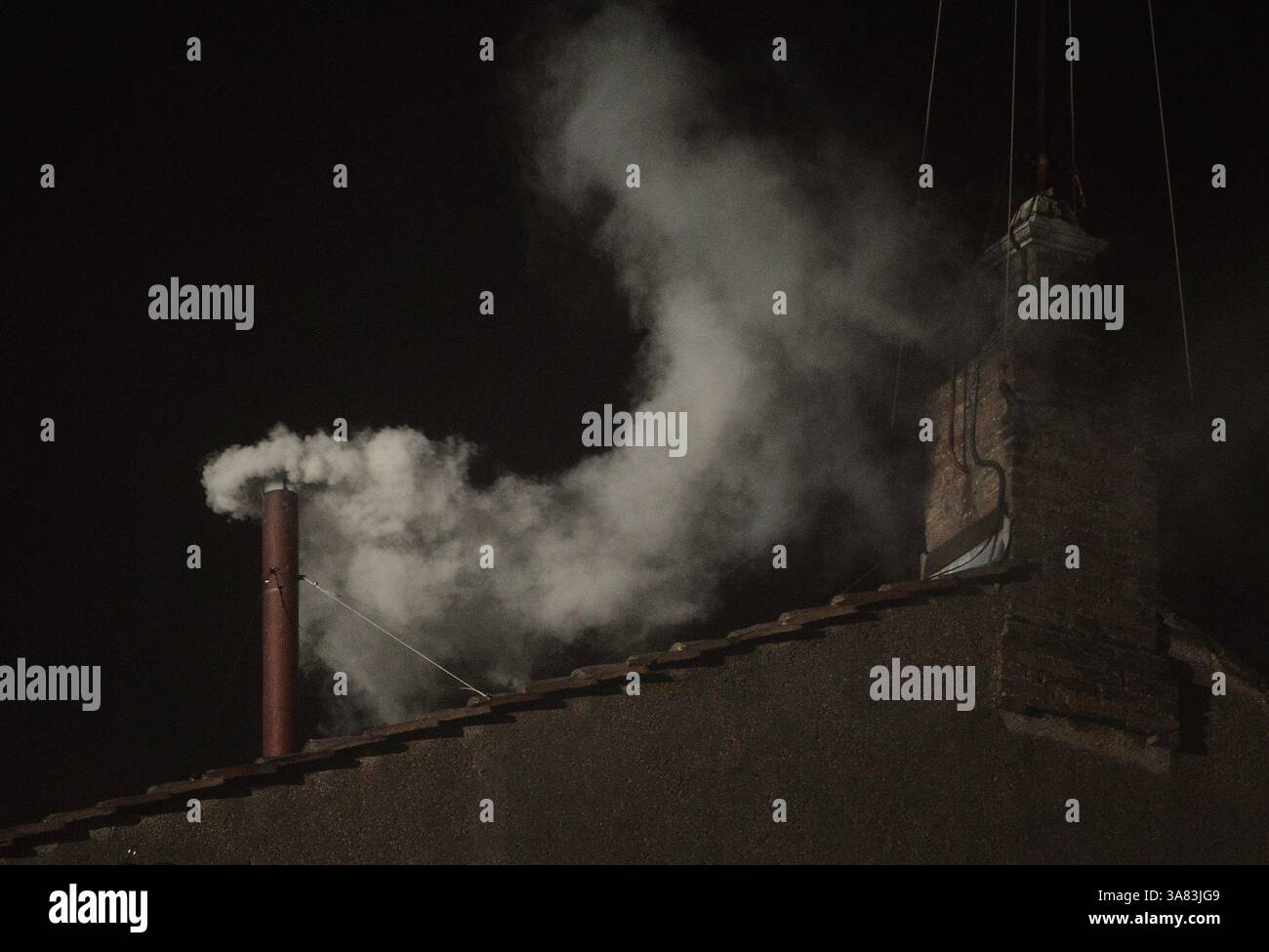 March 13, 2013 - Vatican City - White smoke is seen from the roof of ...