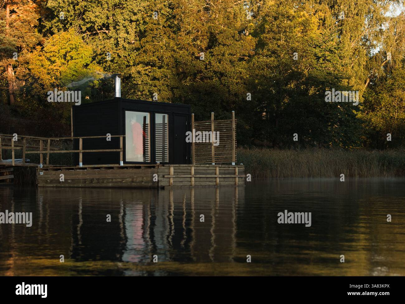 woman inside a floating sauna in the Swedish archipelago Stock Photo ...