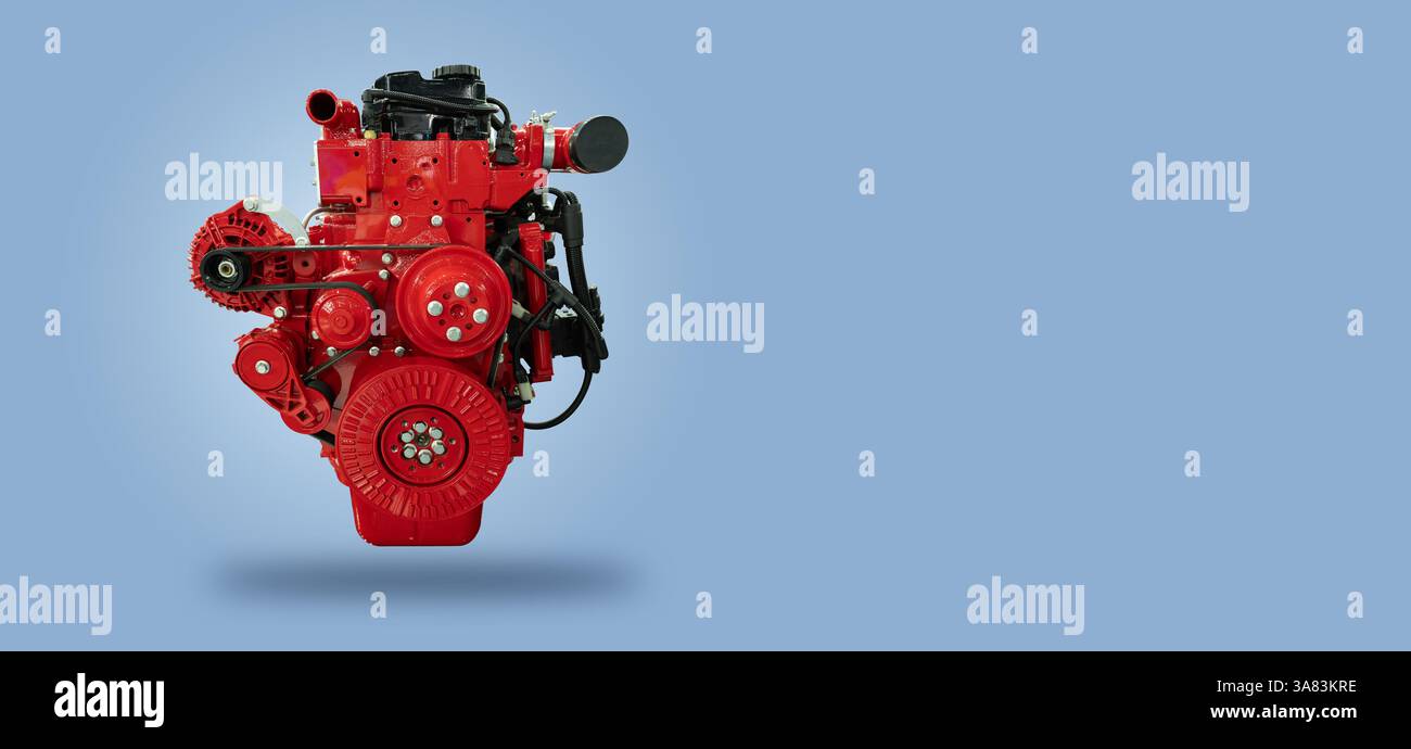 Red diesel engine on blue background Stock Photo - Alamy