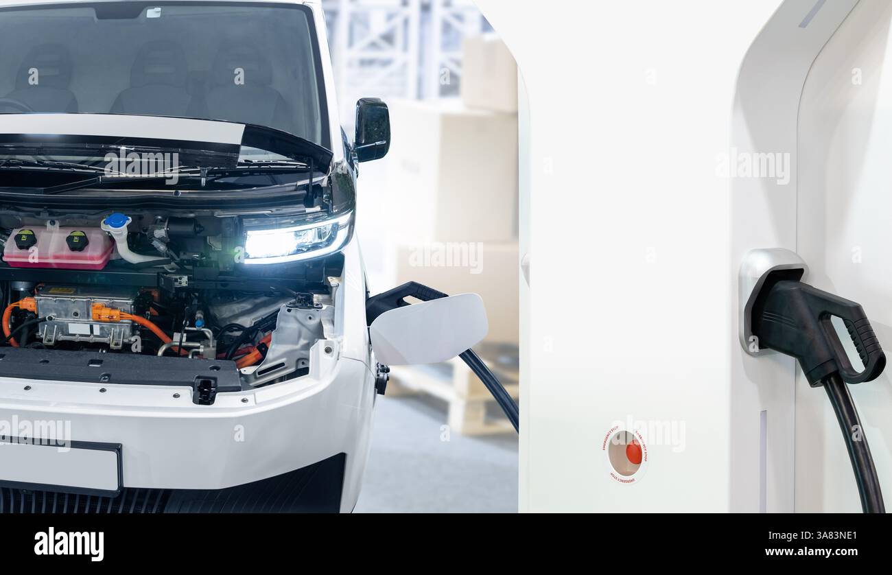 Charging electric van with open hood Stock Photo - Alamy