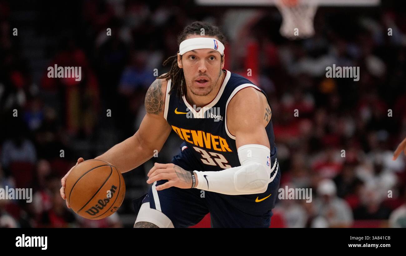 Denver Nuggets forward Aaron Gordon controls the ball during an NBA ...