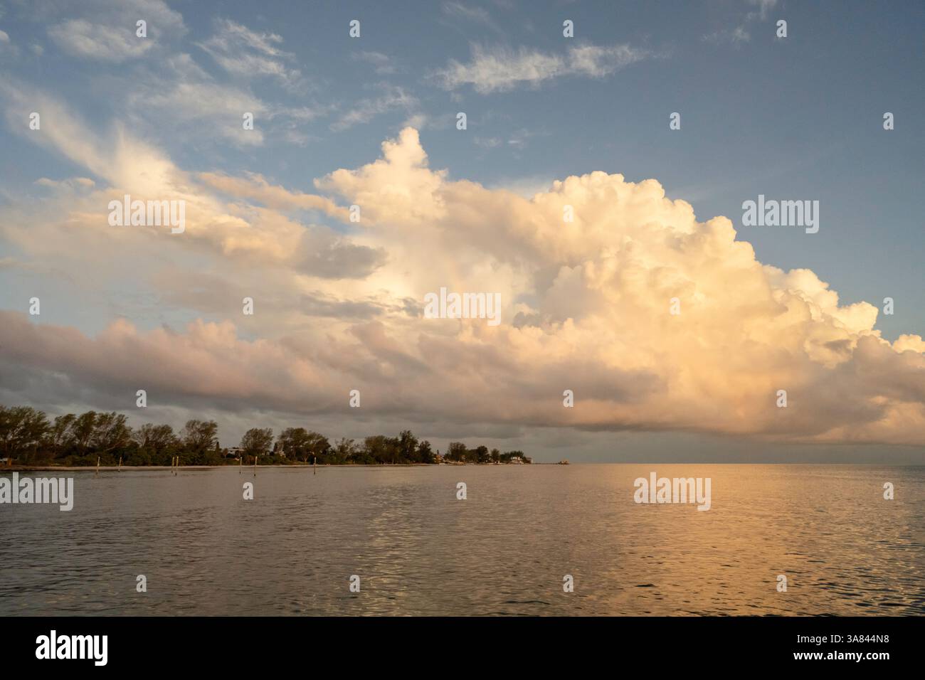 Rainbow in white clouds over Anna Maria Island, Florida Stock Photo - Alamy