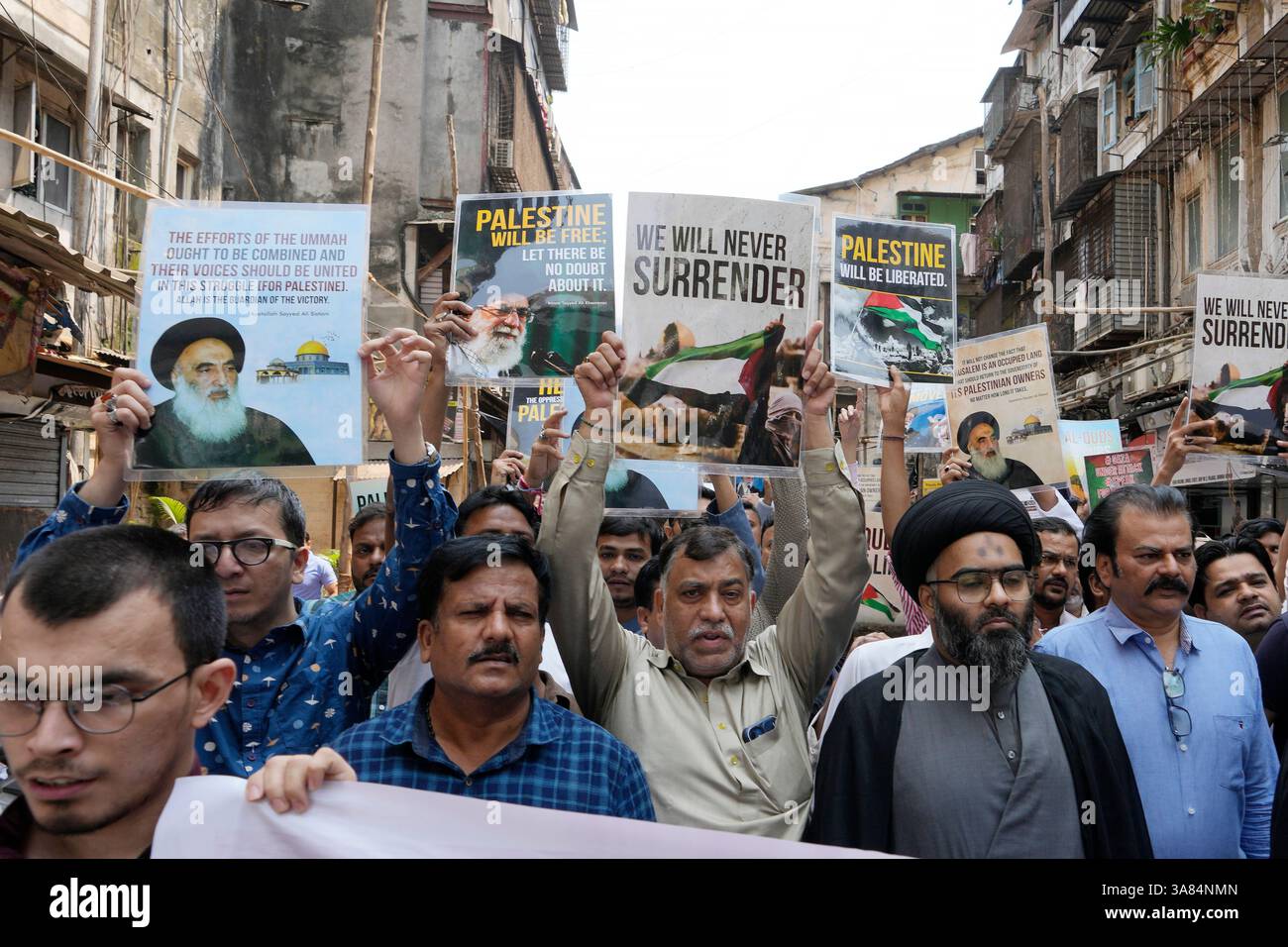 Indian Muslims participate in a march to condemn the oppression by ...
