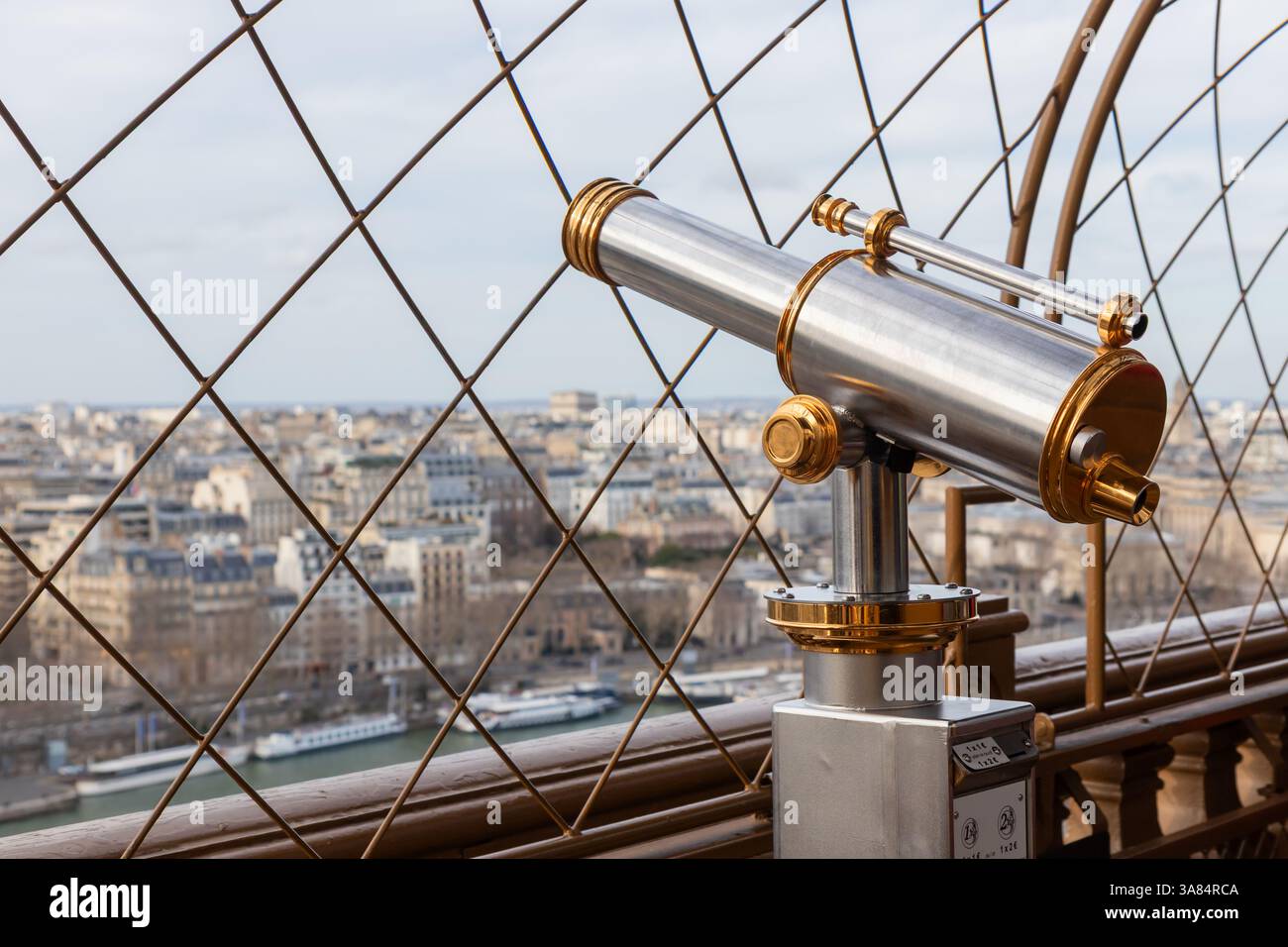 View of Paris. Telescope binoculars on the Eiffel Tower in Paris ...