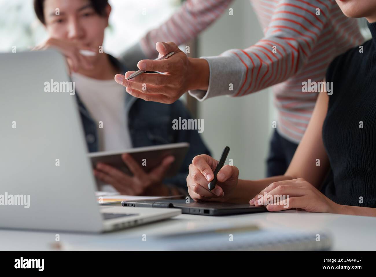 Innovative Design Process and Team Dynamics. Team members collaborating ...