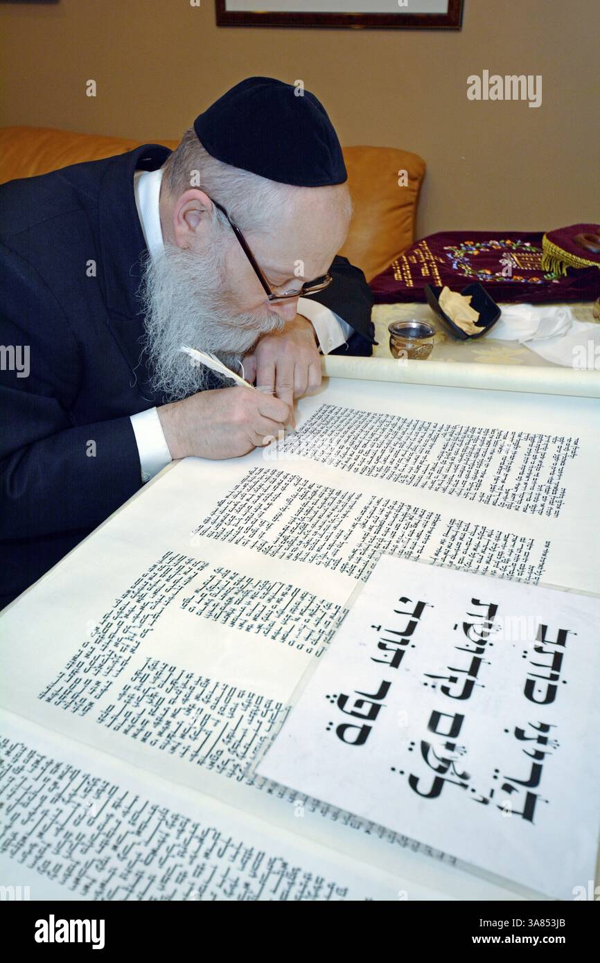 A rabbi and scribe nears the completion of the writing of a new Torah ...