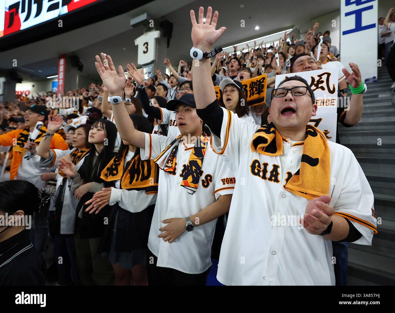 Baseball fans watch the season-opening game of Nihon professional ...