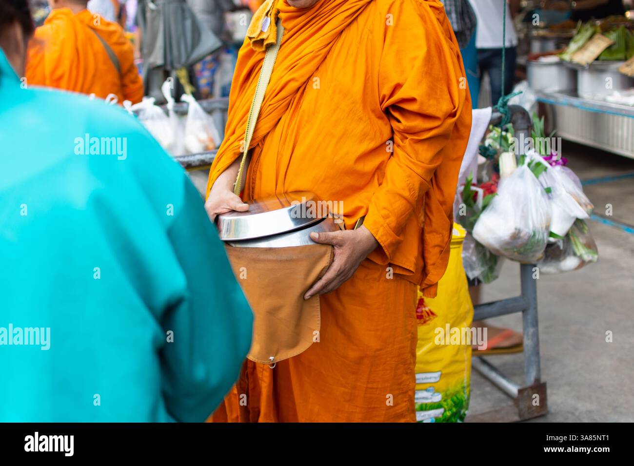 Thai monk ask for alms in morning for buddhist to make merit to offer ...