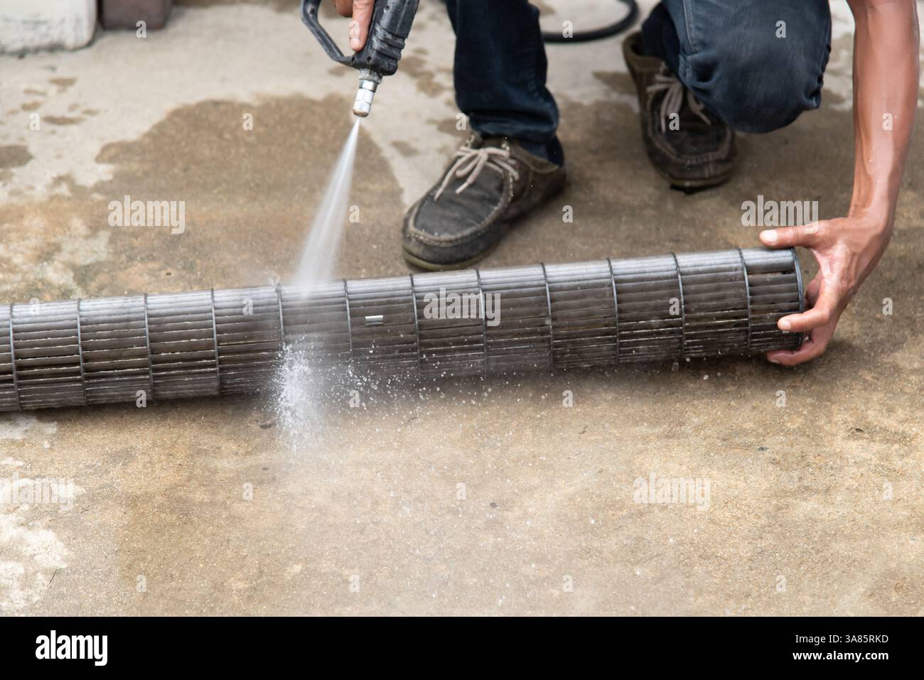 Worker to cleaning coil cooler of air conditioner by water for clean a ...