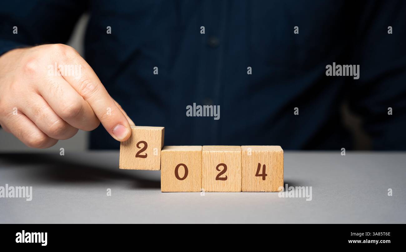 Wooden blocks with the inscription 2024. Setting goals and objectives ...