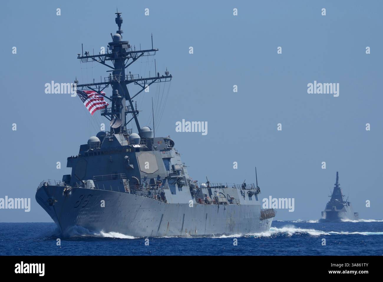 A US Navy USS Shoup (DDG86), left, and Japanese Maritime Self-Defence ...