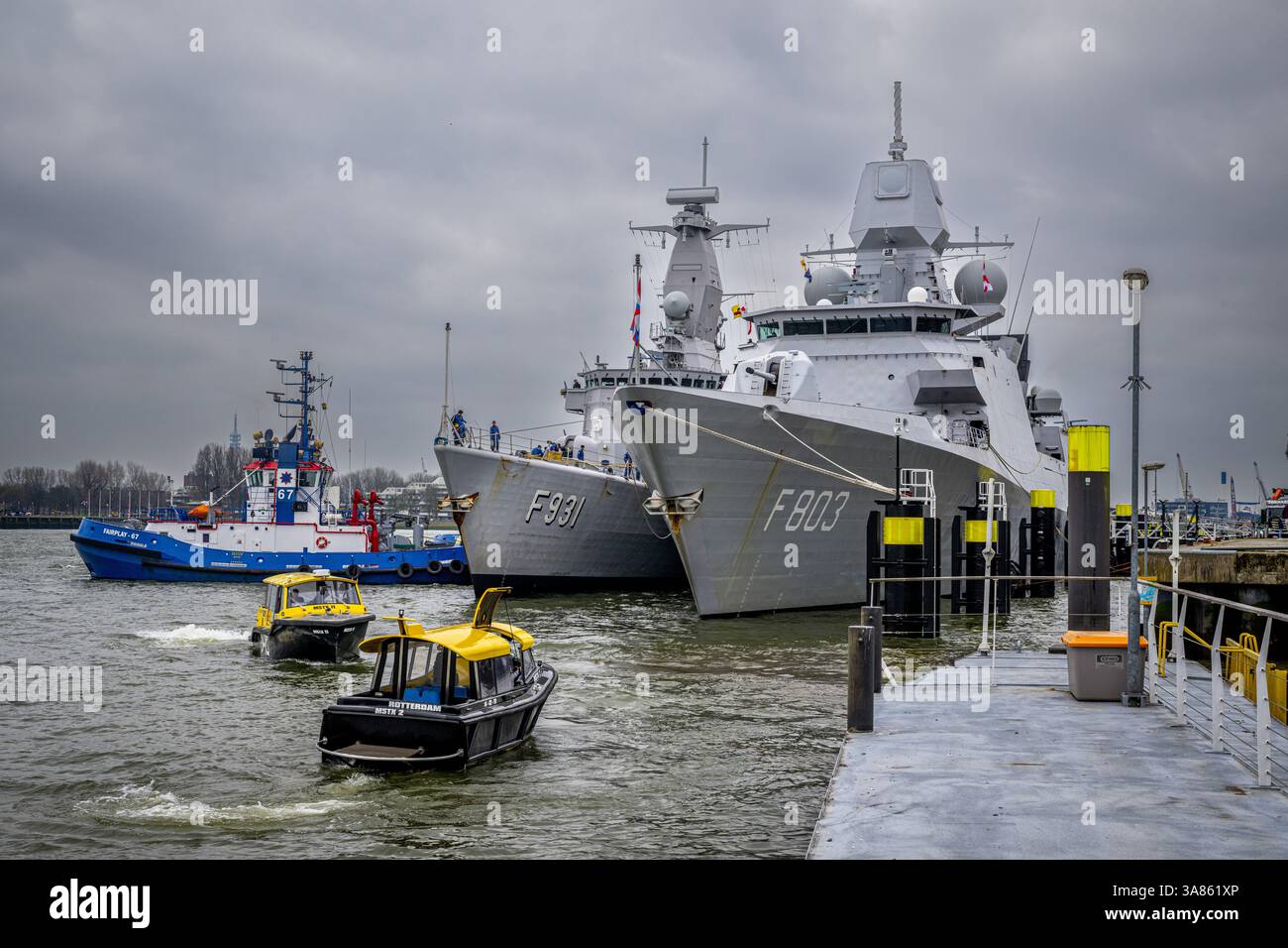 ROTTERDAM - Navy ship Zr.Ms. Tromp while mooring together with the BNS ...