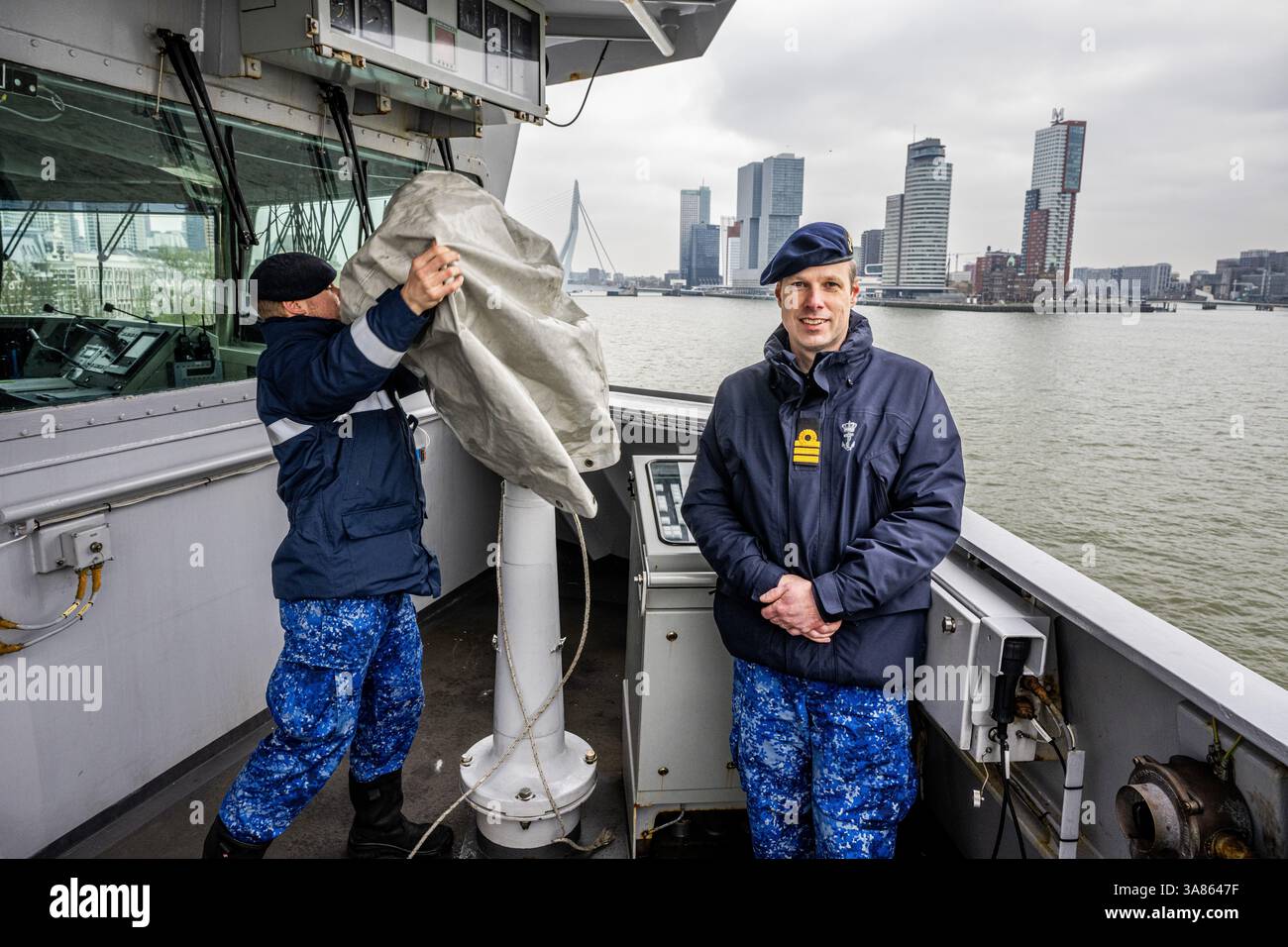 ROTTERDAM - Navy ship Zr.Ms. Tromp while mooring together with the BNS ...