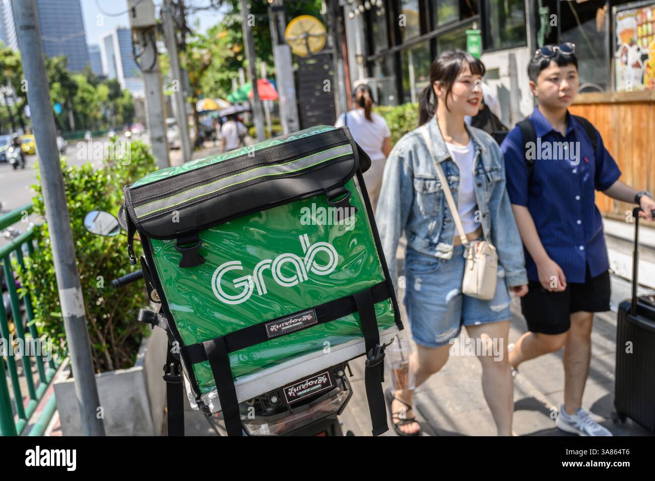Bangkok, Thailand. March 25th 2025. Grab food delivery motorcycles ...