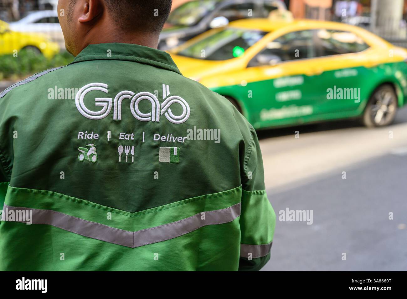 Bangkok, Thailand. March 25th 2025. Ride, Eat, Deliver, the Grab food ...