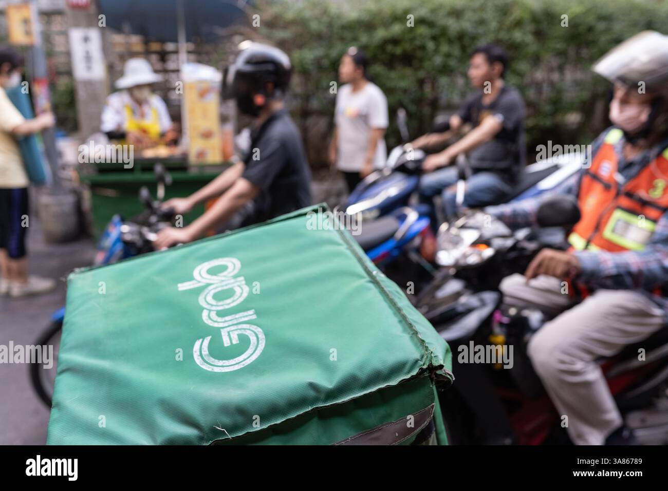 Bangkok, Thailand. March 25th 2025. A Grab food delivery service logo ...