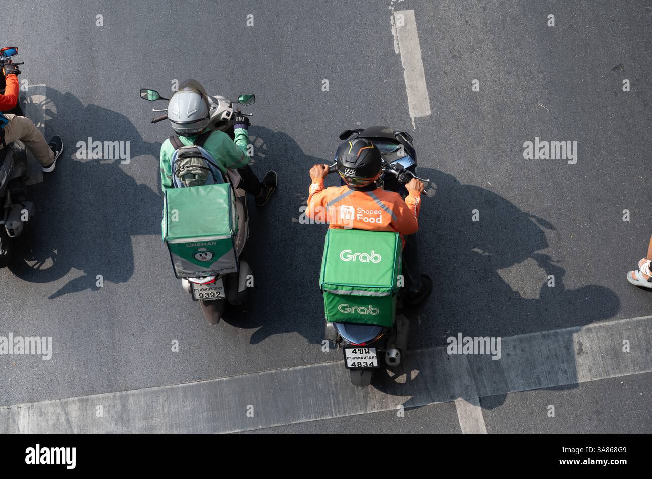 Bangkok, Thailand. March 25th 2025. A Grab food delivery motorcycle ...