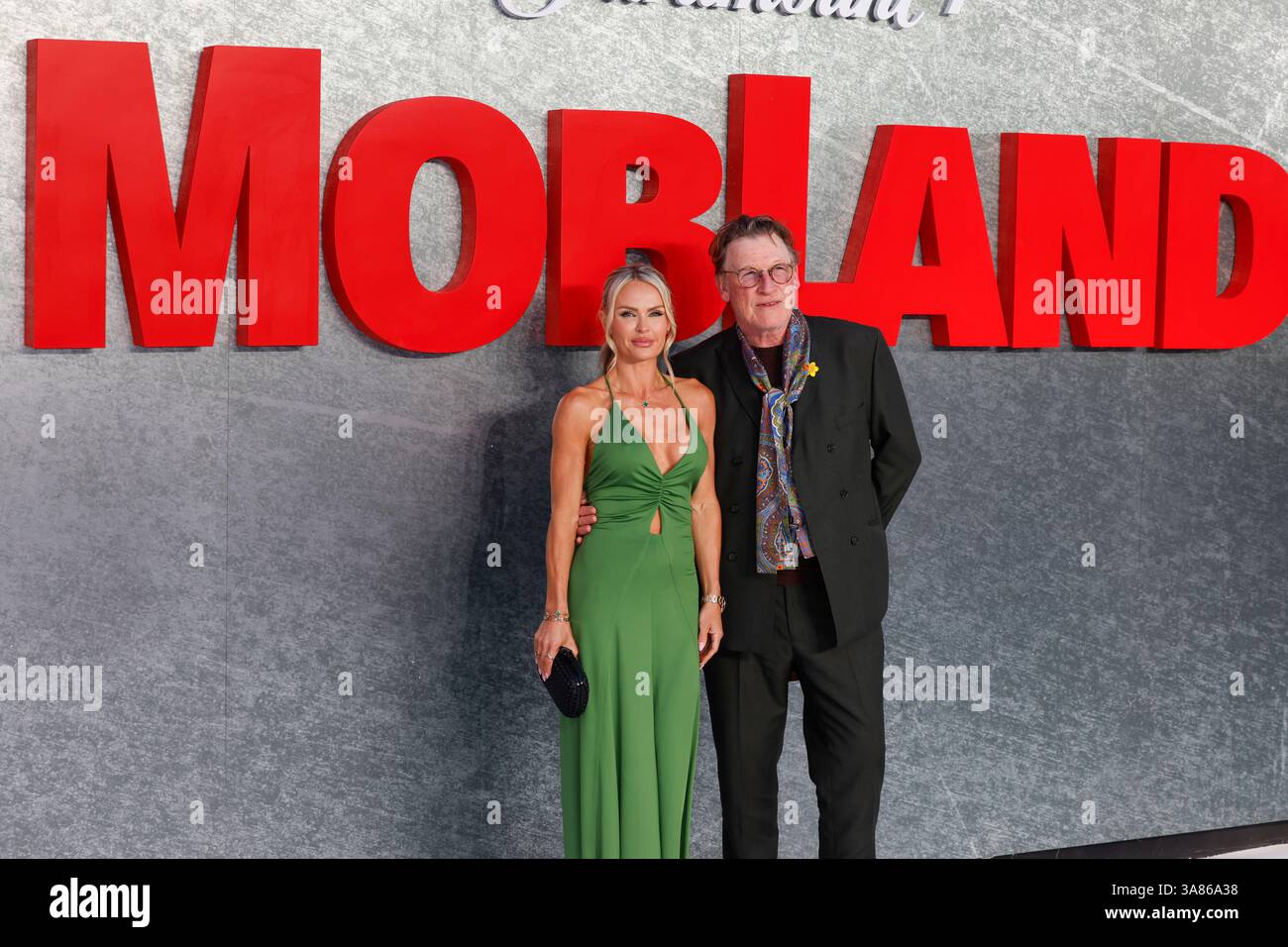 Annie Cooper and Geoff Bell attend the MobLand Global Premiere at Odeon ...