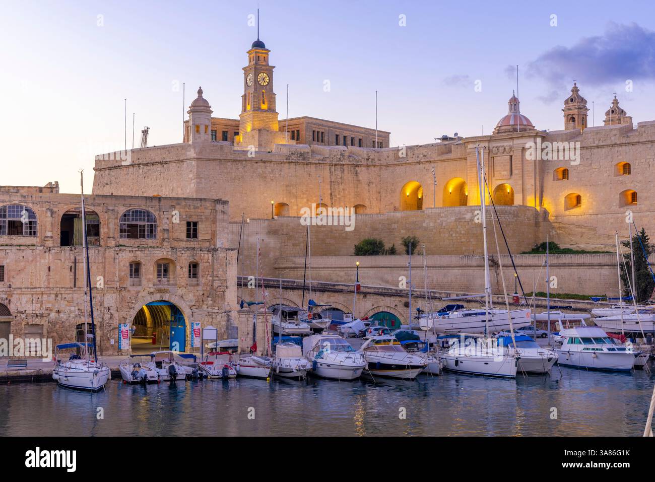 The Old Dock Buildings at Bormla Waterfront with Fort St. Michael Clock Tower in the background ...