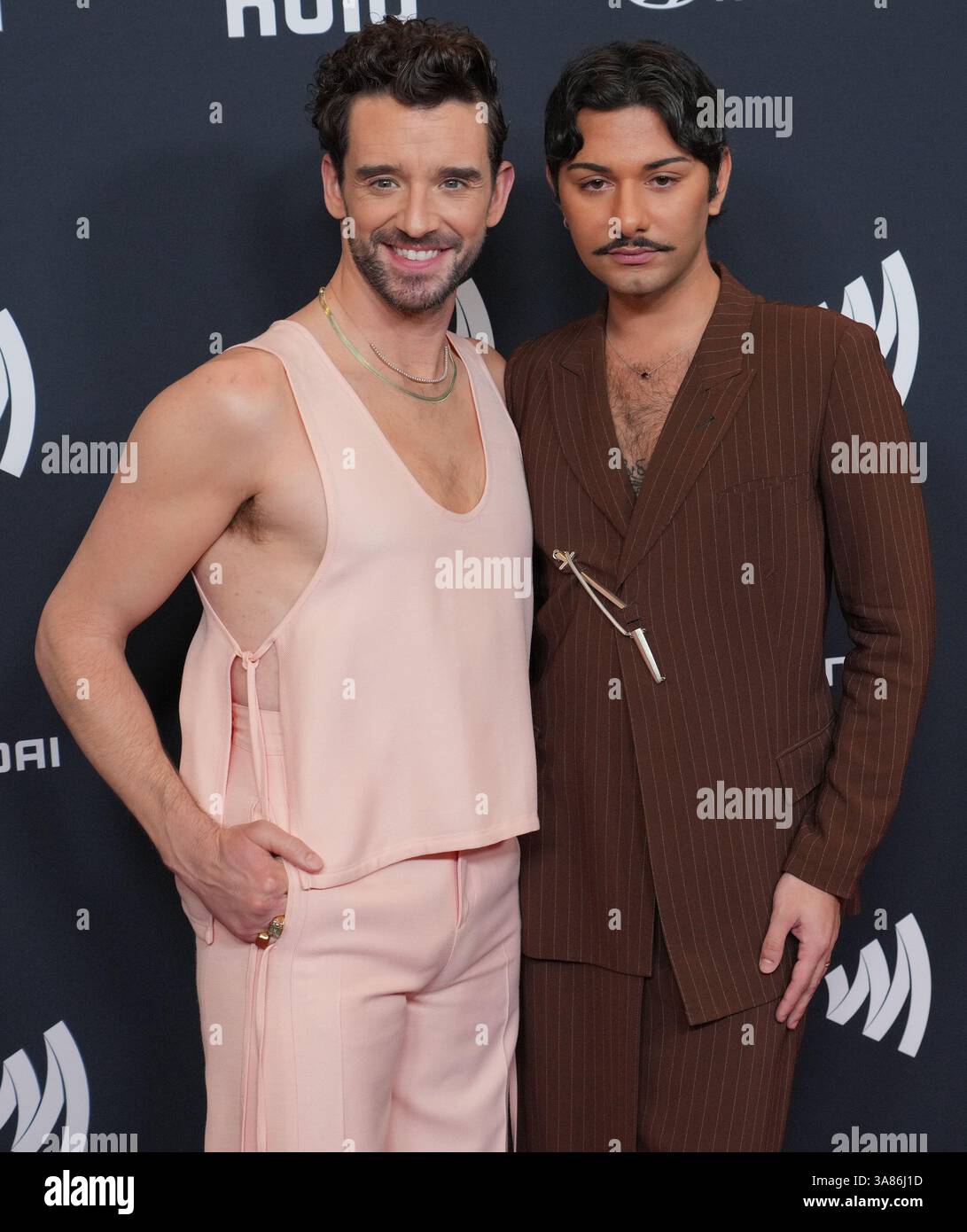 Los Angeles, USA. 27th Mar, 2025. (L-R) Michael Urie and Mark ...