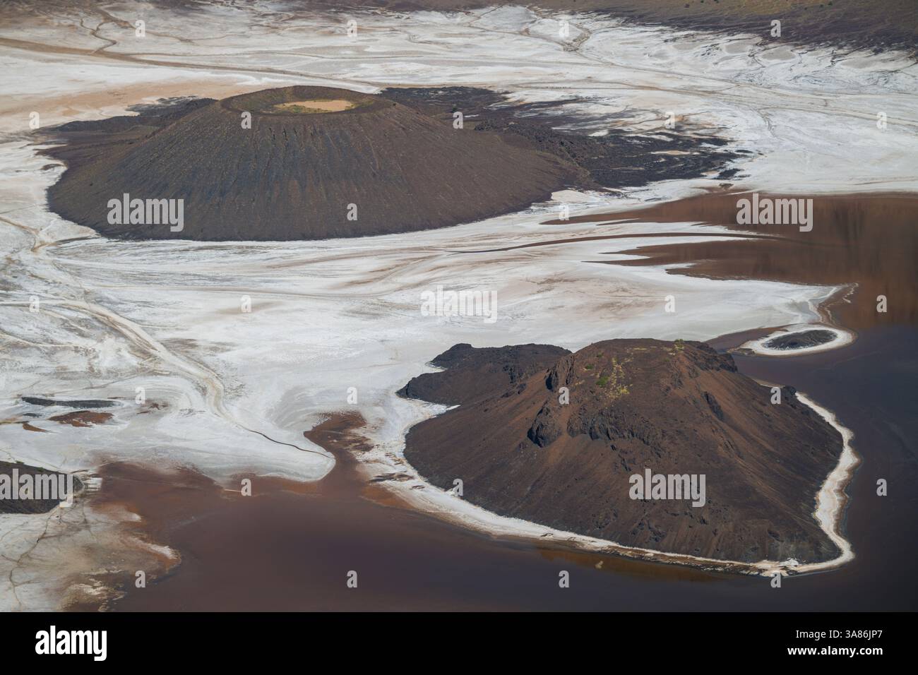 Aerial of the Trou du Natron volcanic crater and its natron lakes ...