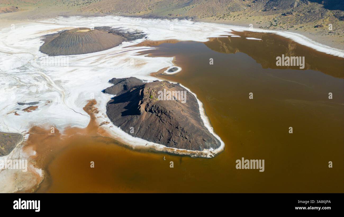 Aerial of the Trou du Natron volcanic crater and its natron lakes ...