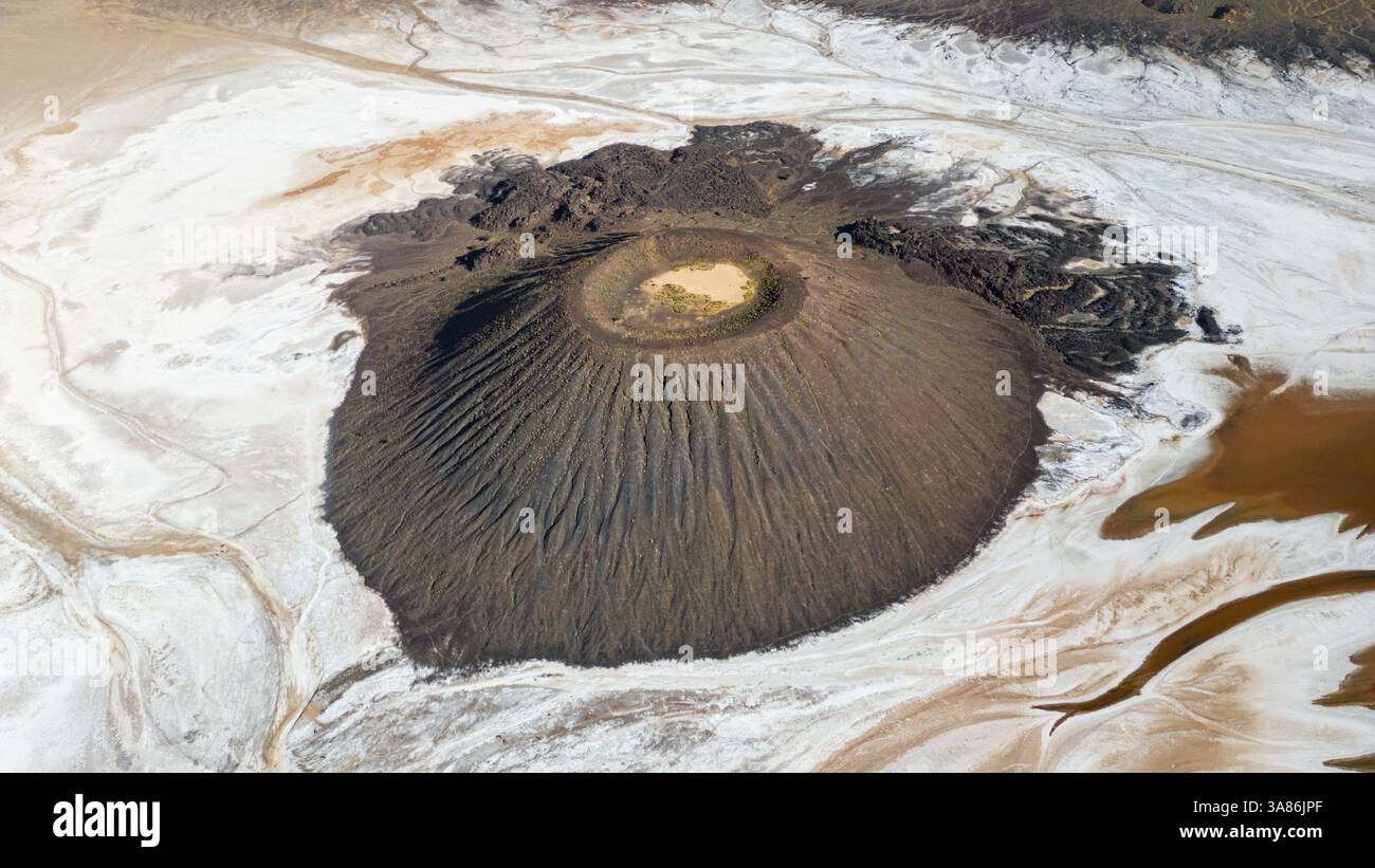 Aerial of the Trou du Natron volcanic crater and its natron lakes ...