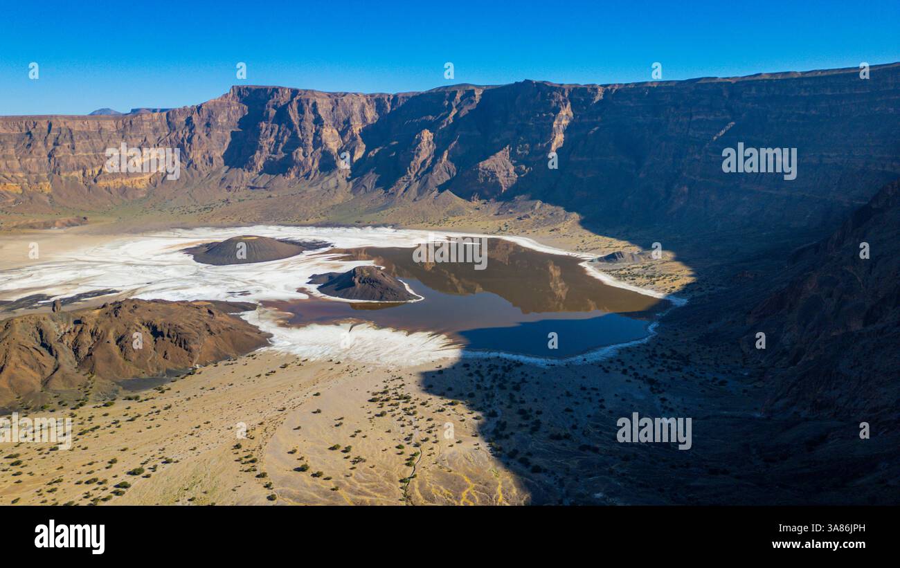 Aerial of the Trou du Natron volcanic crater and its natron lakes ...