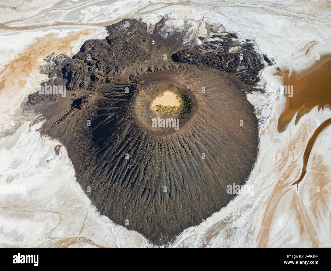 Aerial of the Trou du Natron volcanic crater and its natron lakes ...