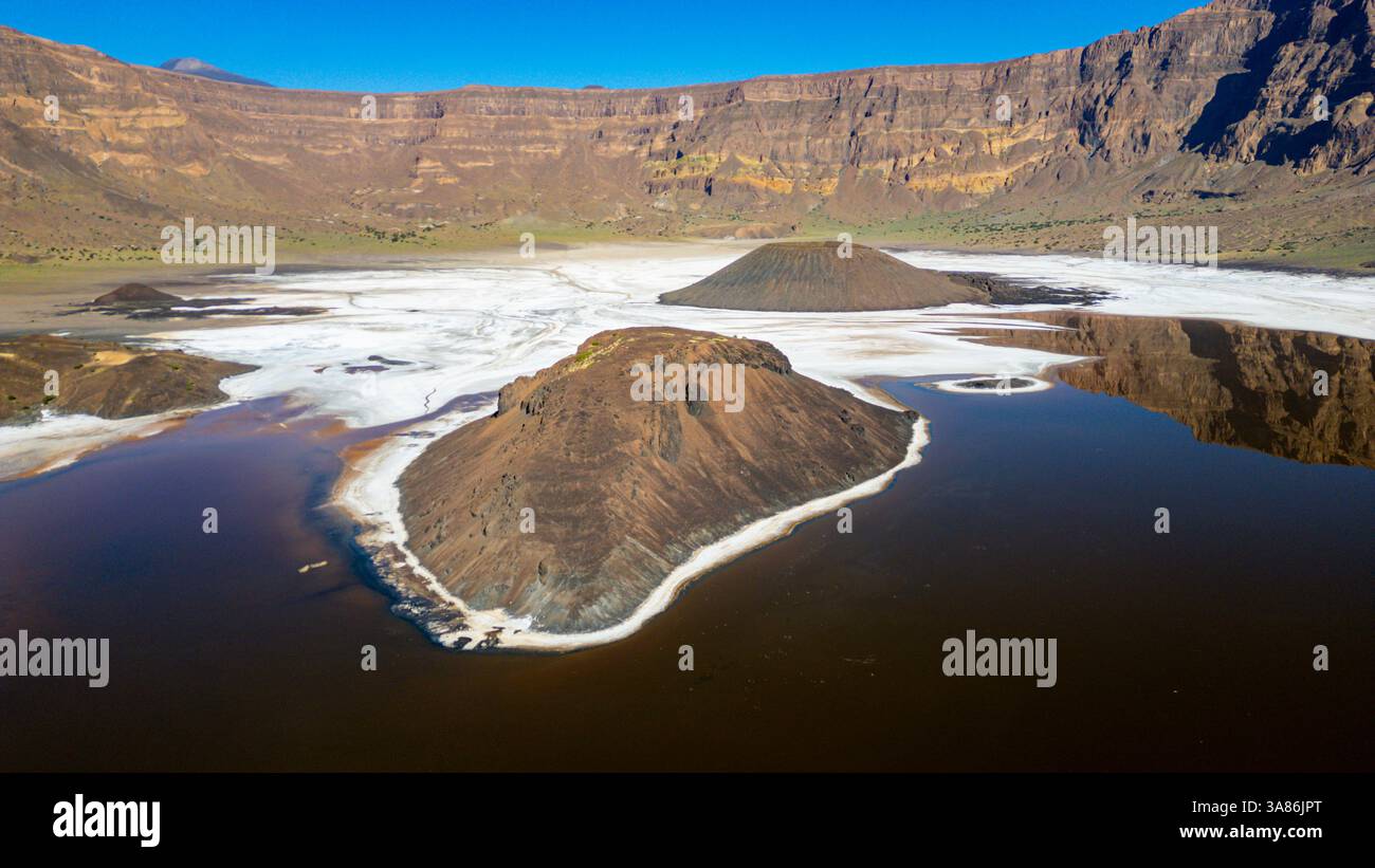 Aerial of the Trou du Natron volcanic crater and its natron lakes ...