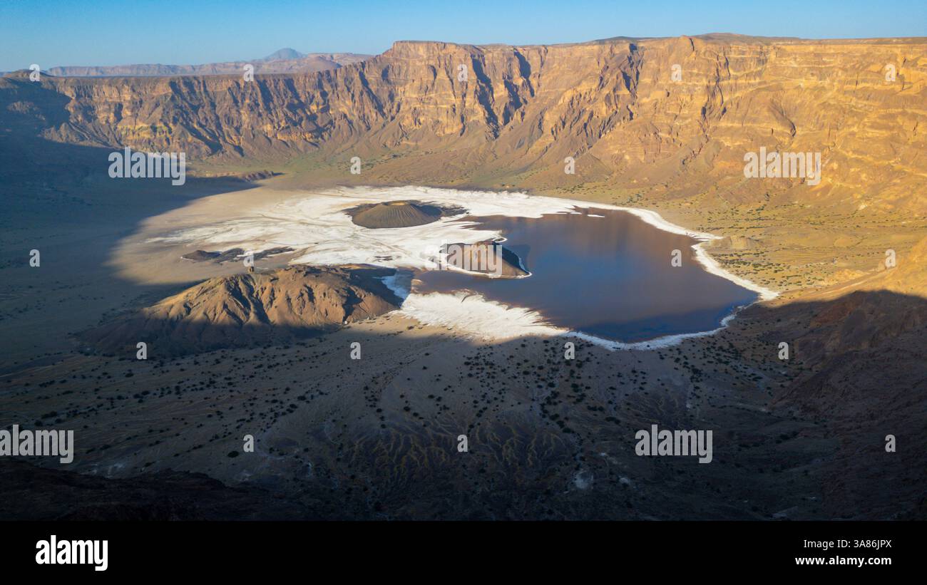 Aerial of the Trou du Natron volcanic crater and its natron lakes ...