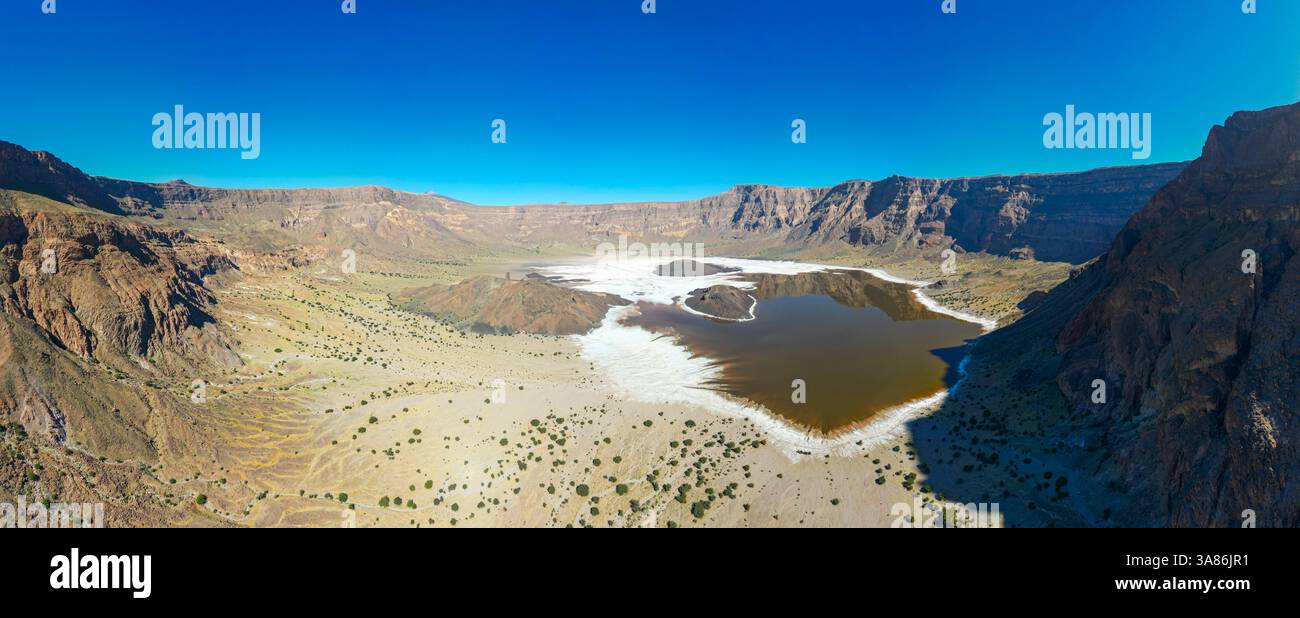 Aerial of the Trou du Natron volcanic crater and its natron lakes ...