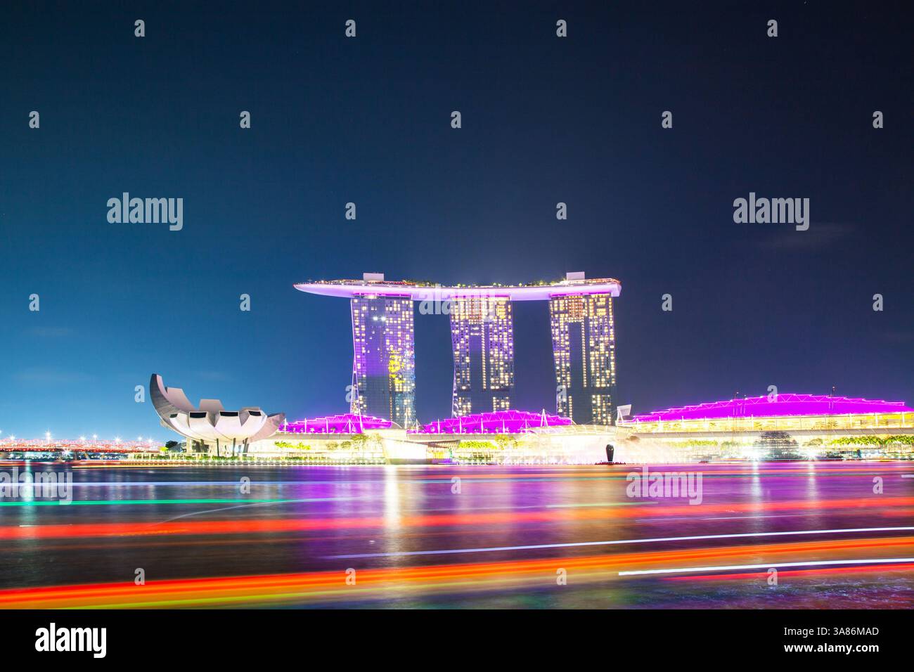 Skyline of Singapore Marina Bay at night with Marina Bay Sands, Art ...
