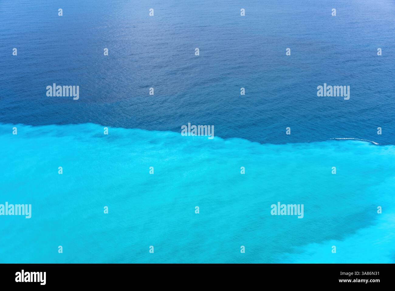 Sea division between turquoise water and deep blue, Greece Stock Photo ...
