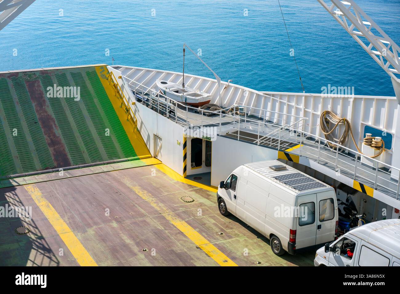 Camper van on ferry boat in the sea crossing to Peloponnese, Greece ...