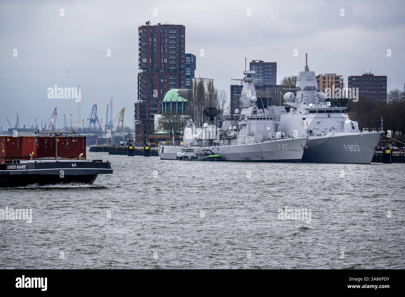 ROTTERDAM - Navy ship Zr.Ms. Tromp while mooring together with the BNS ...