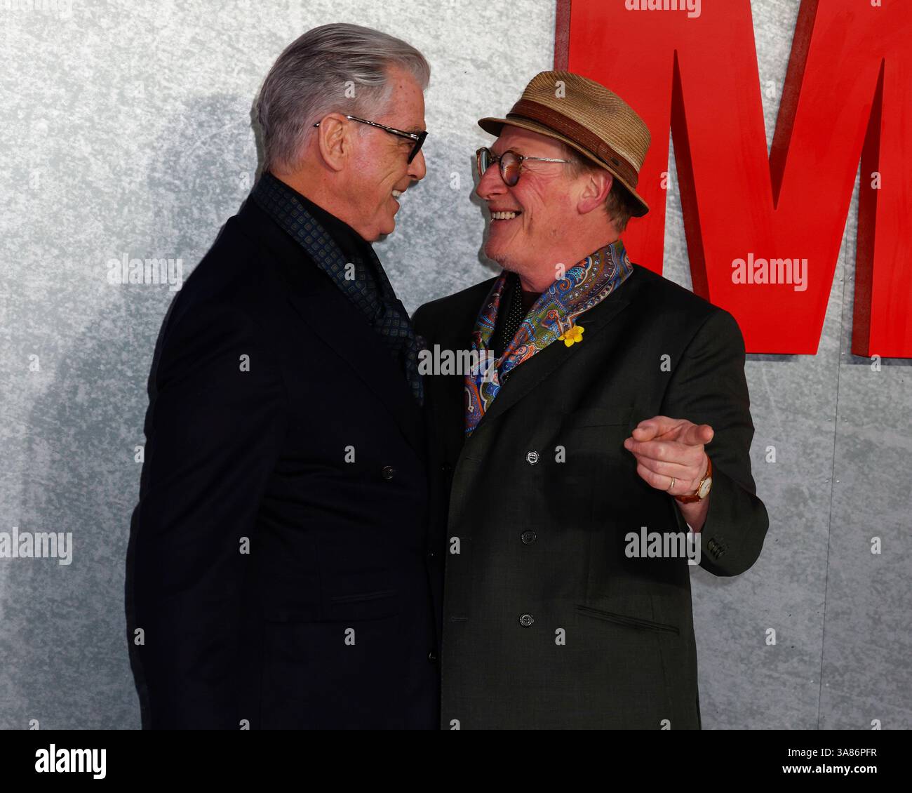 London, UK. 27th Mar, 2025. Pierce Brosnan and Geoff Bell attend the ...