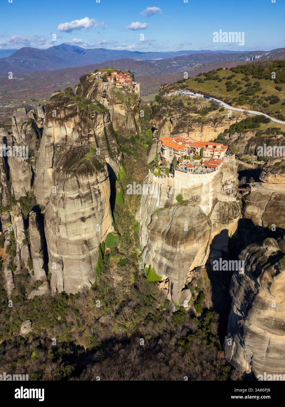 Drone aerial view of Meteora with ancient holy Monastery of Varlaam and ...