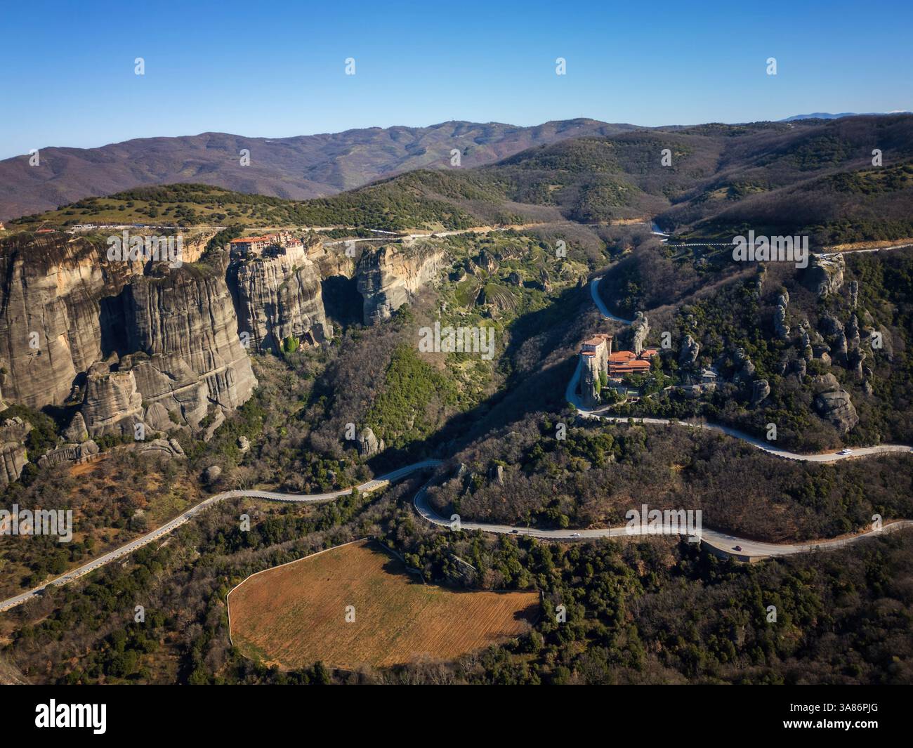 Drone aerial view of Meteora with ancient holy Monastery of Varlaam and ...