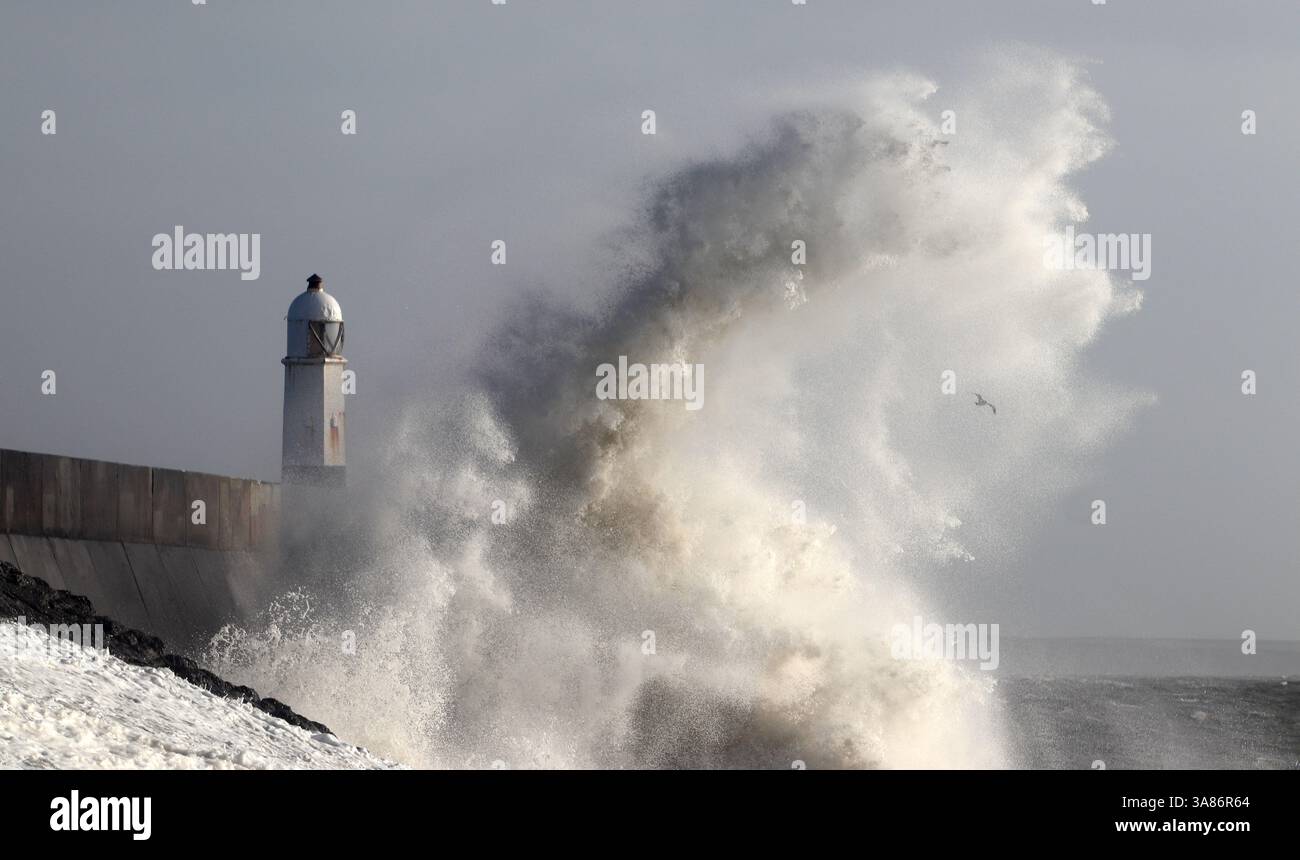 Storm waves (Storm Eowyn), Porthcawl Pier, South Wales, United Kingdom ...