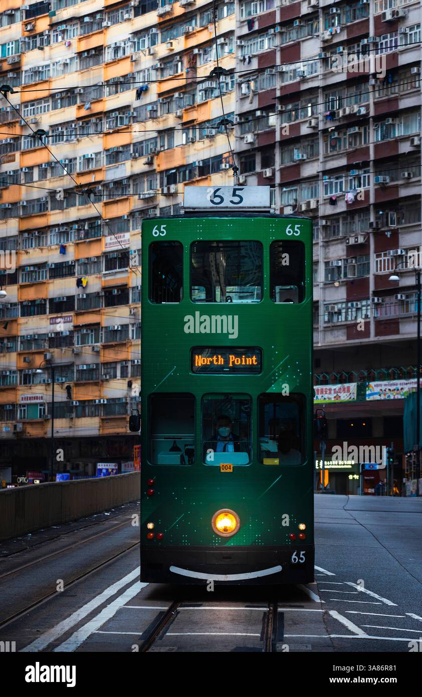Green tram and Nam Tin building, North Point, Hong Kong, China Stock ...