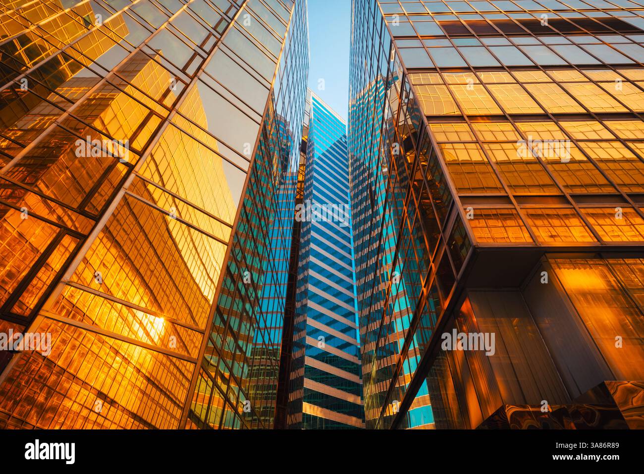 Gateway boulevard at harbour with golden buildings at sunset, Kowloon ...