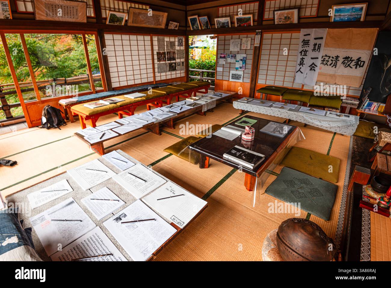 Tatami room in a Kyoto temple, featuring scrolls, ink drawings, and ...