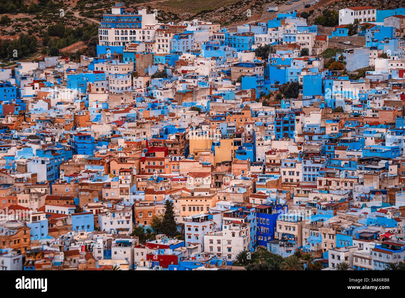 Blue houses in the medina and skyline at sunrise, Chefchaouen, Morocco ...