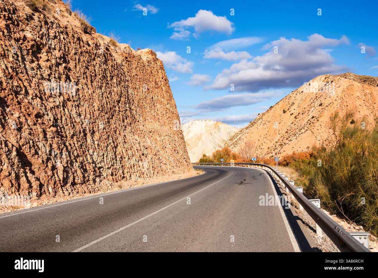 Road through gorge desert landscape around Gorafe, Andalusia, Spain ...