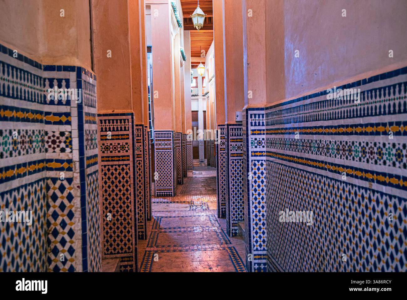 Walls decorated in mosaic in an empty Souk of Fes, Morocco Stock Photo ...
