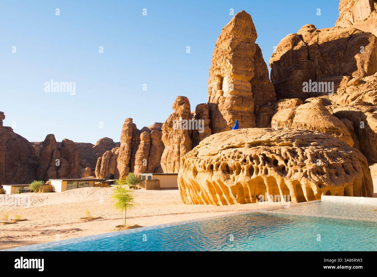 Swimming pool, surrounded by sandstone rock structures, Our Habitas ...