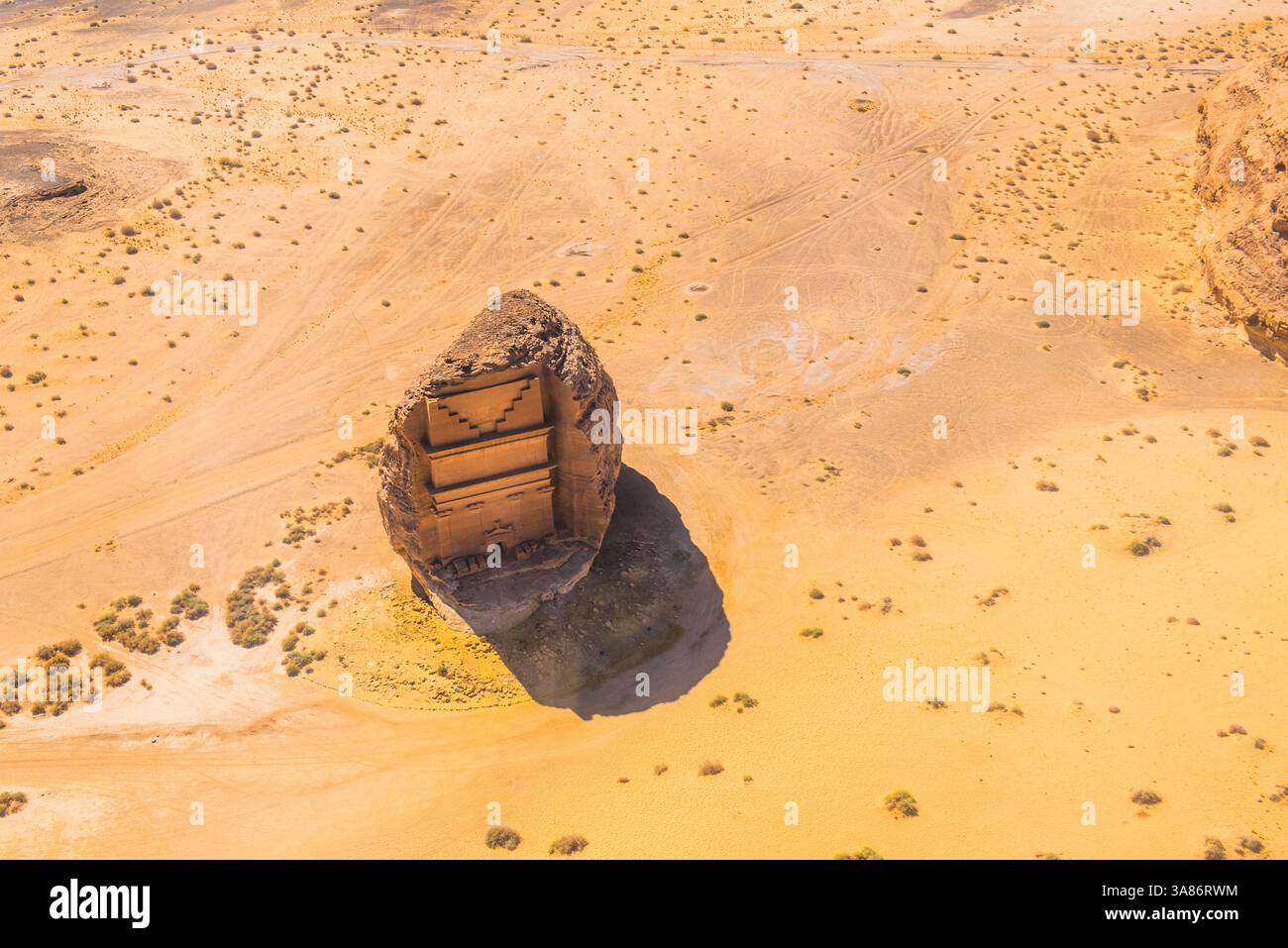 Aerial view of Qasr al-Farid, the largest tomb within Site of Hegra ...